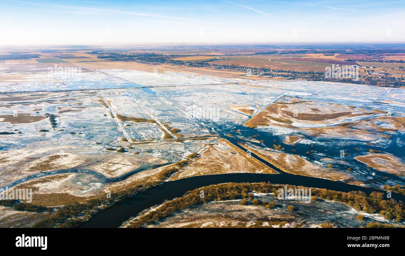 Spring rural aerial landscape. Frozen winter river. Spring melting ...