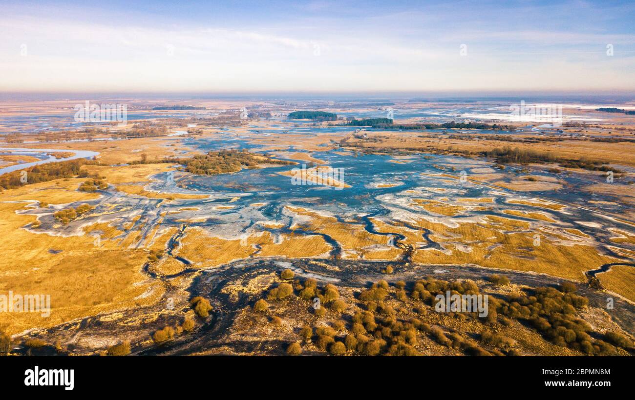 Spring rural aerial landscape. Frozen winter river. Spring melting ...