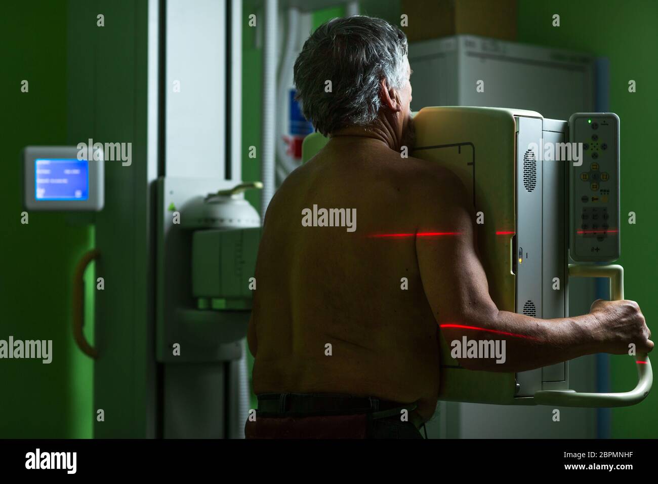 Healthcare Concept - Senior male patient undergoing an X-ray ...