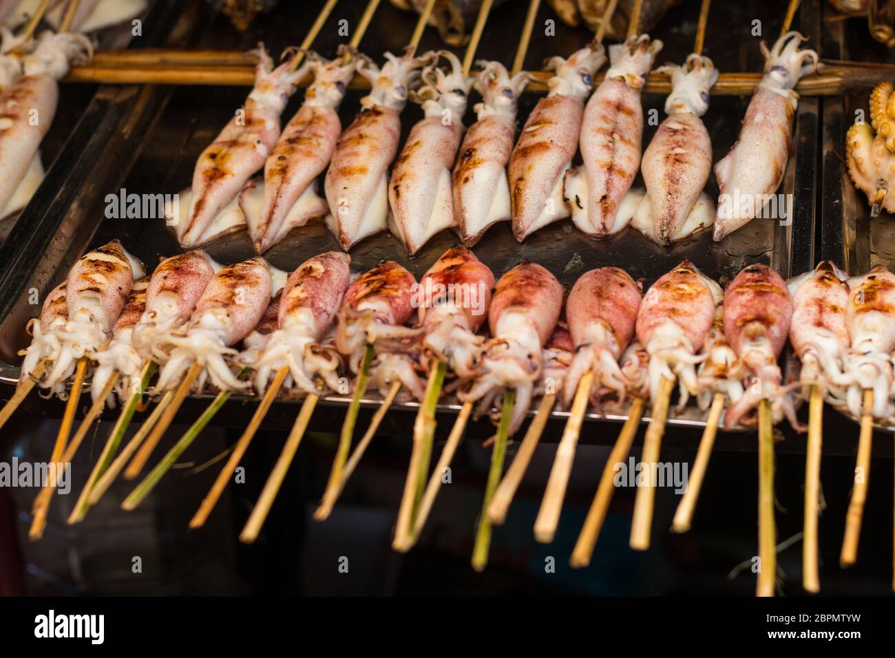 Fresh fish street market on the river in South Asia, meat, and fish are ...