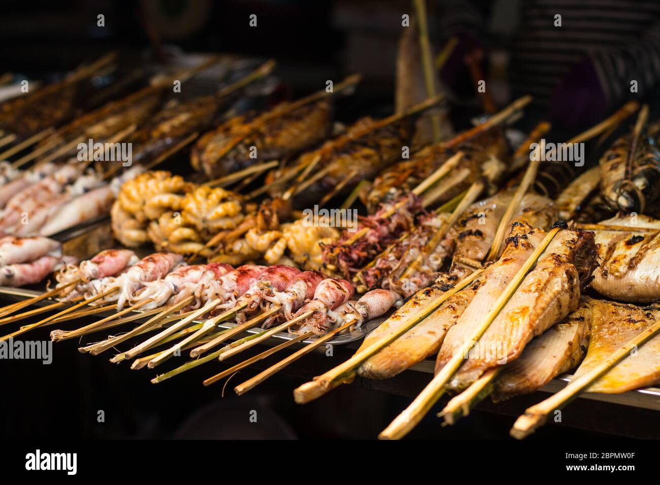 Fresh fish street market on the river in South Asia, meat, and fish are ...