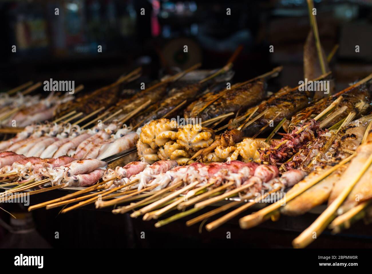 Fresh fish street market on the river in South Asia, meat, and fish are ...