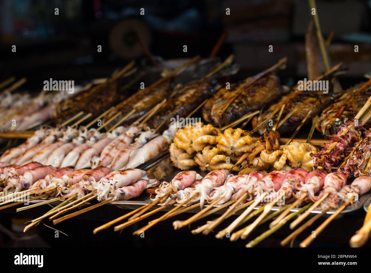 Fresh fish street market on the river in South Asia, meat, and fish are ...