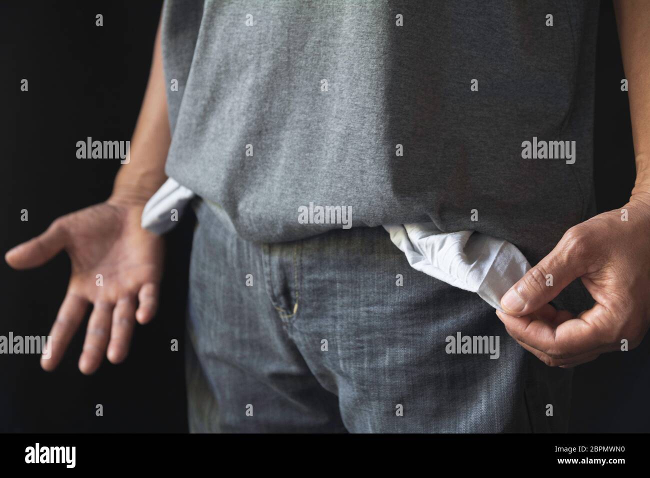 Man showing has no money by turning out the pocket. Empty pocket Stock ...