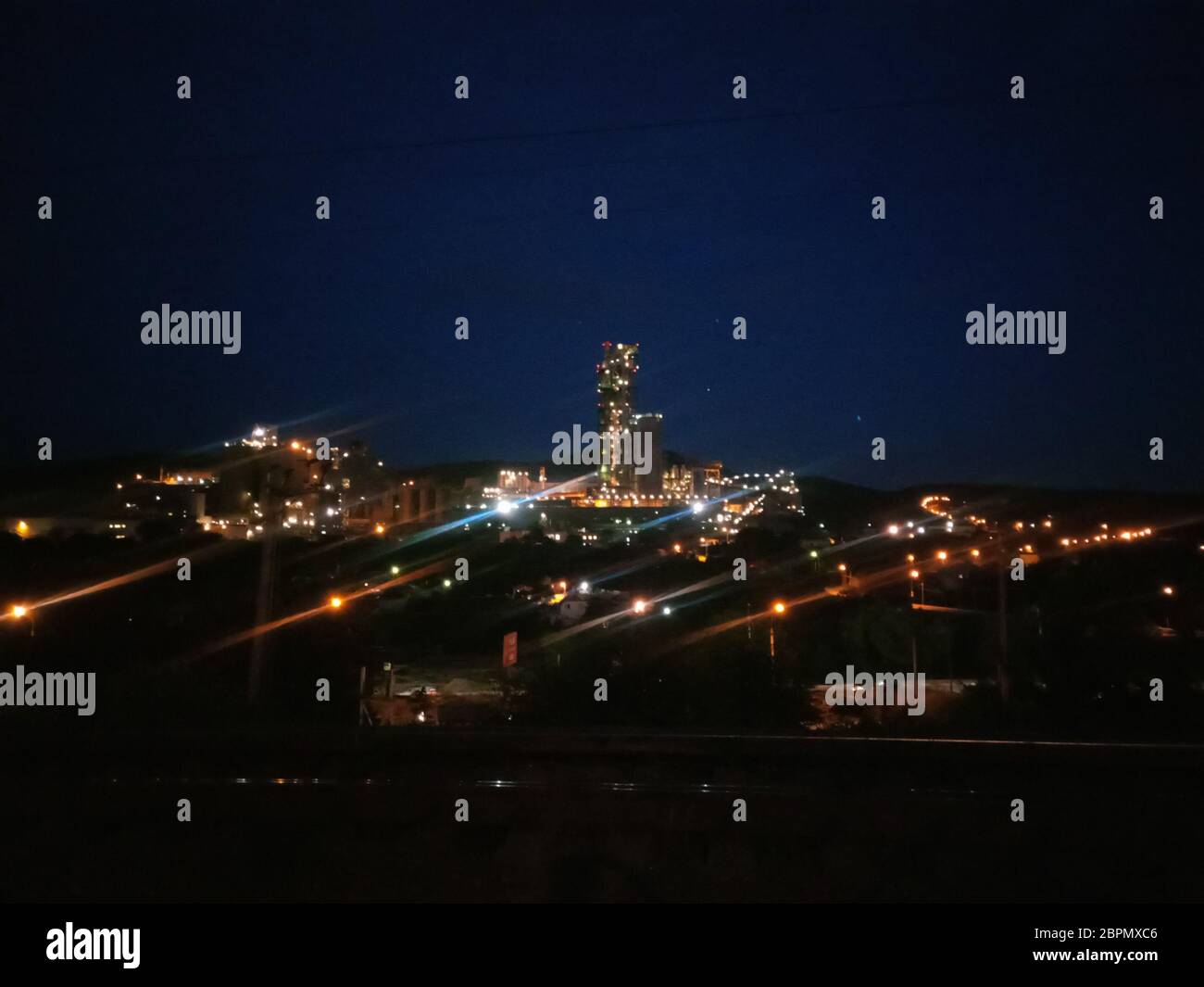 Lit up factory hi-res stock photography and images - Alamy