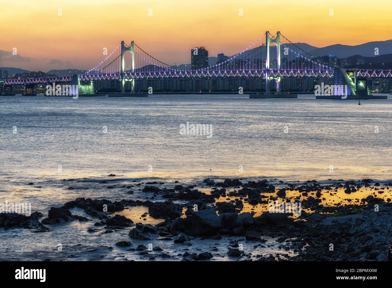 The sunset view over Busan Gwangandaegyo bridge. The famous bridge in ...