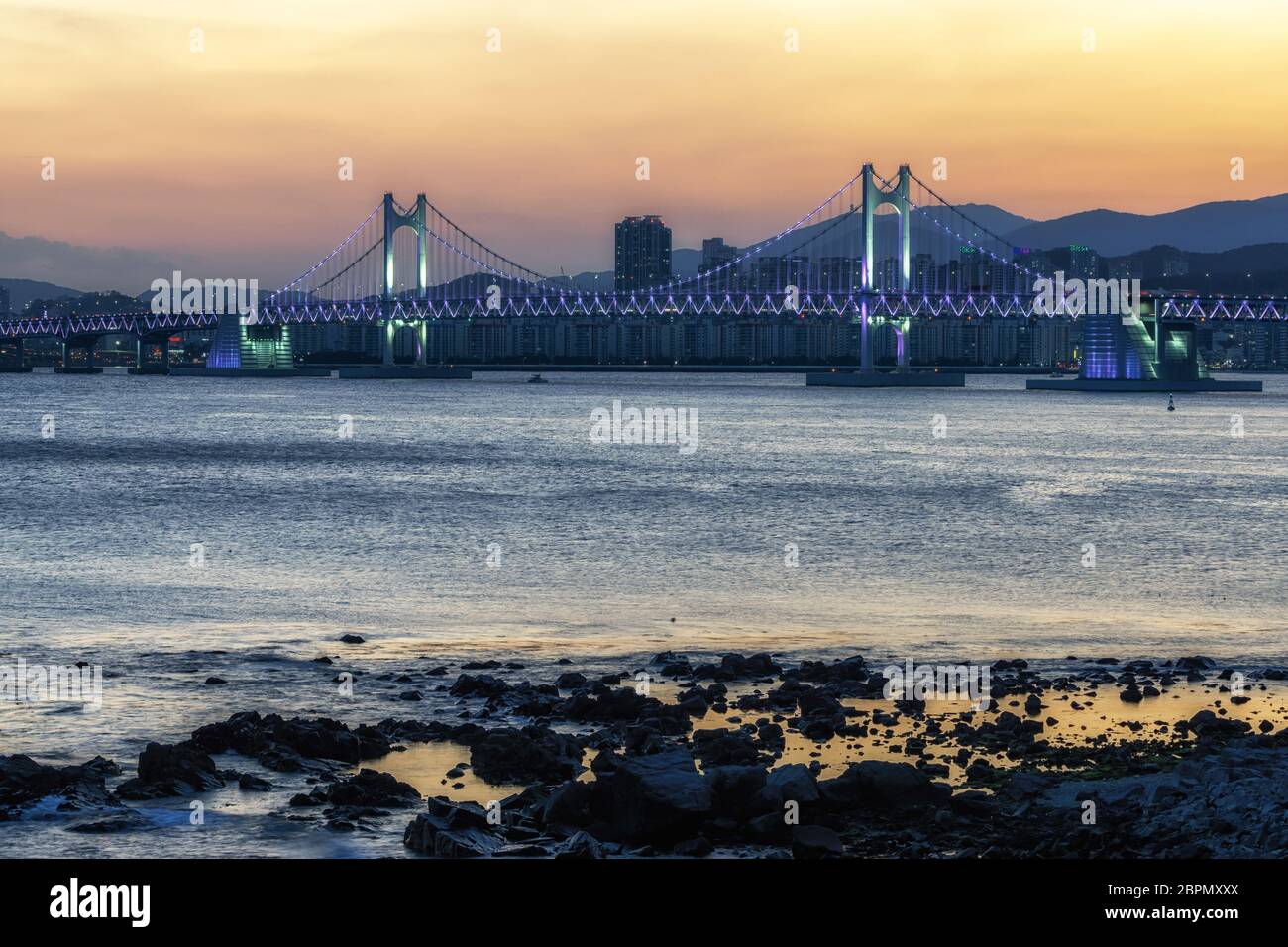 The sunset view over Busan Gwangandaegyo bridge. The famous bridge in ...