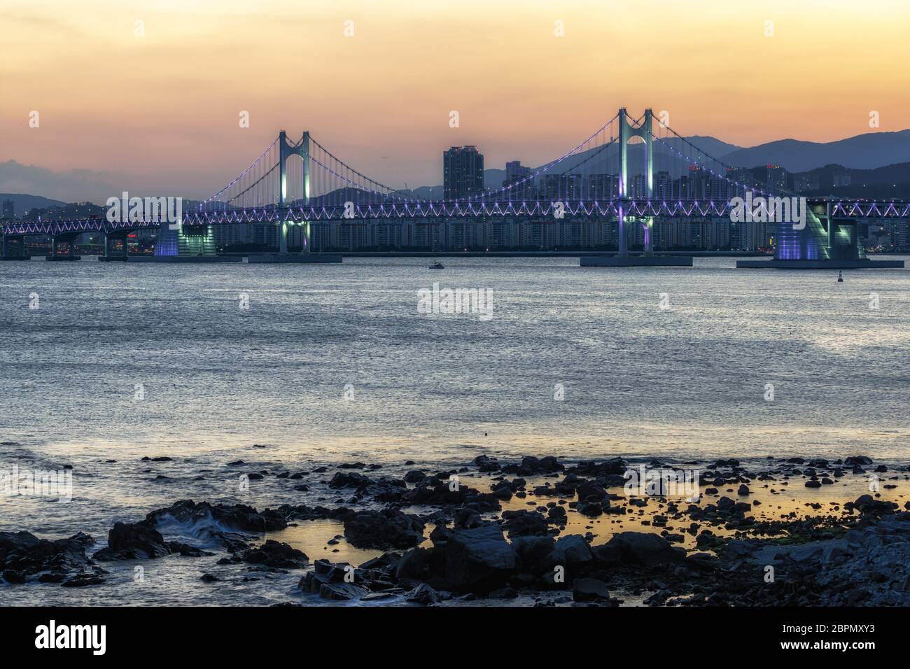 The sunset view over Busan Gwangandaegyo bridge. The famous bridge in ...