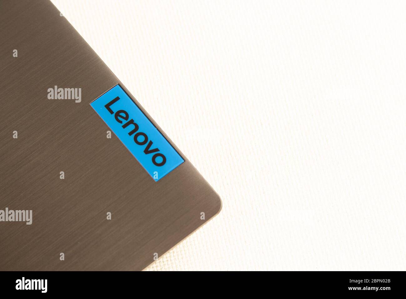 Back side of laptop with lenovo logo isolated on white background Stock ...