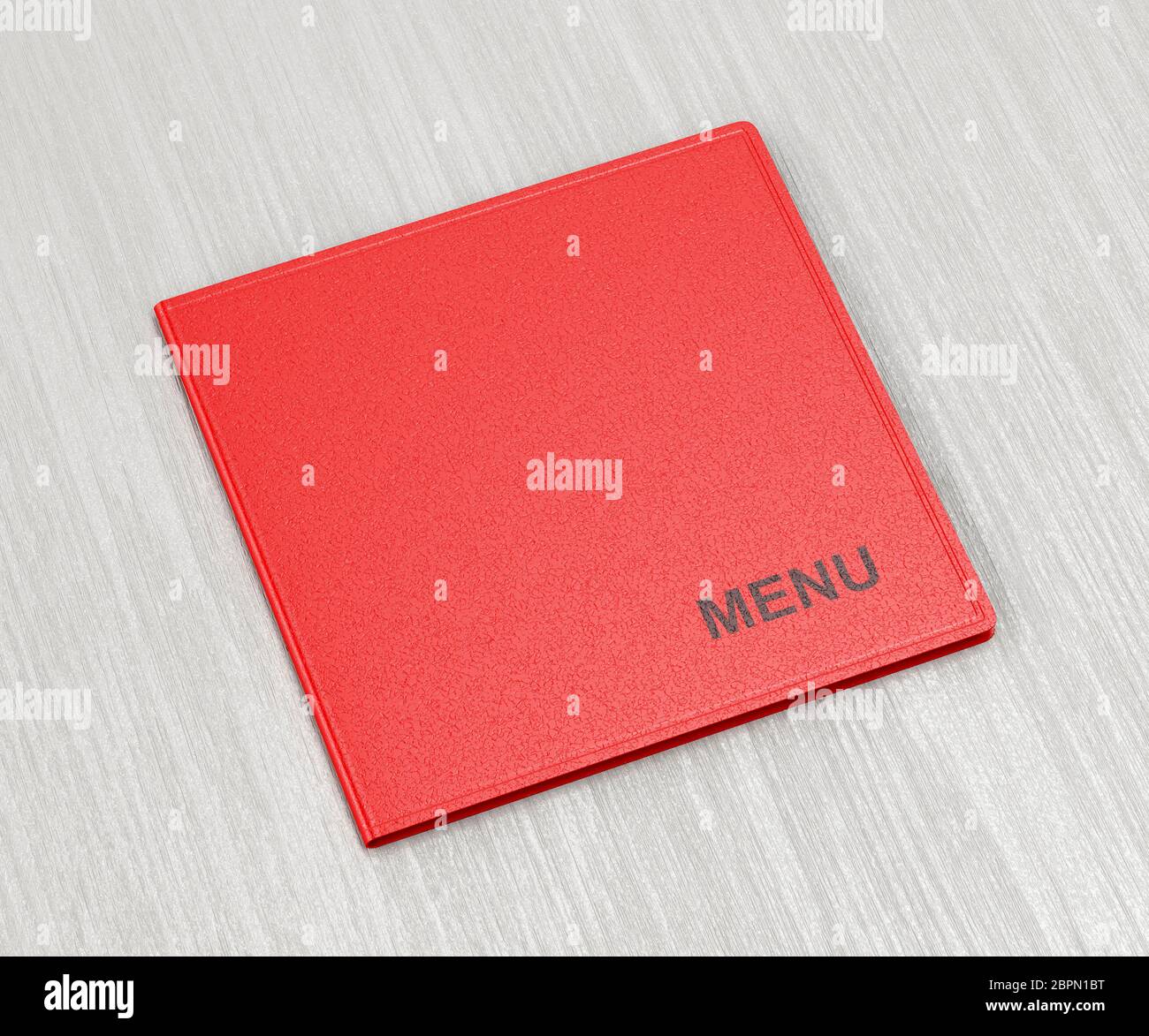 Red menu book on wood table in the restaurant Stock Photo - Alamy