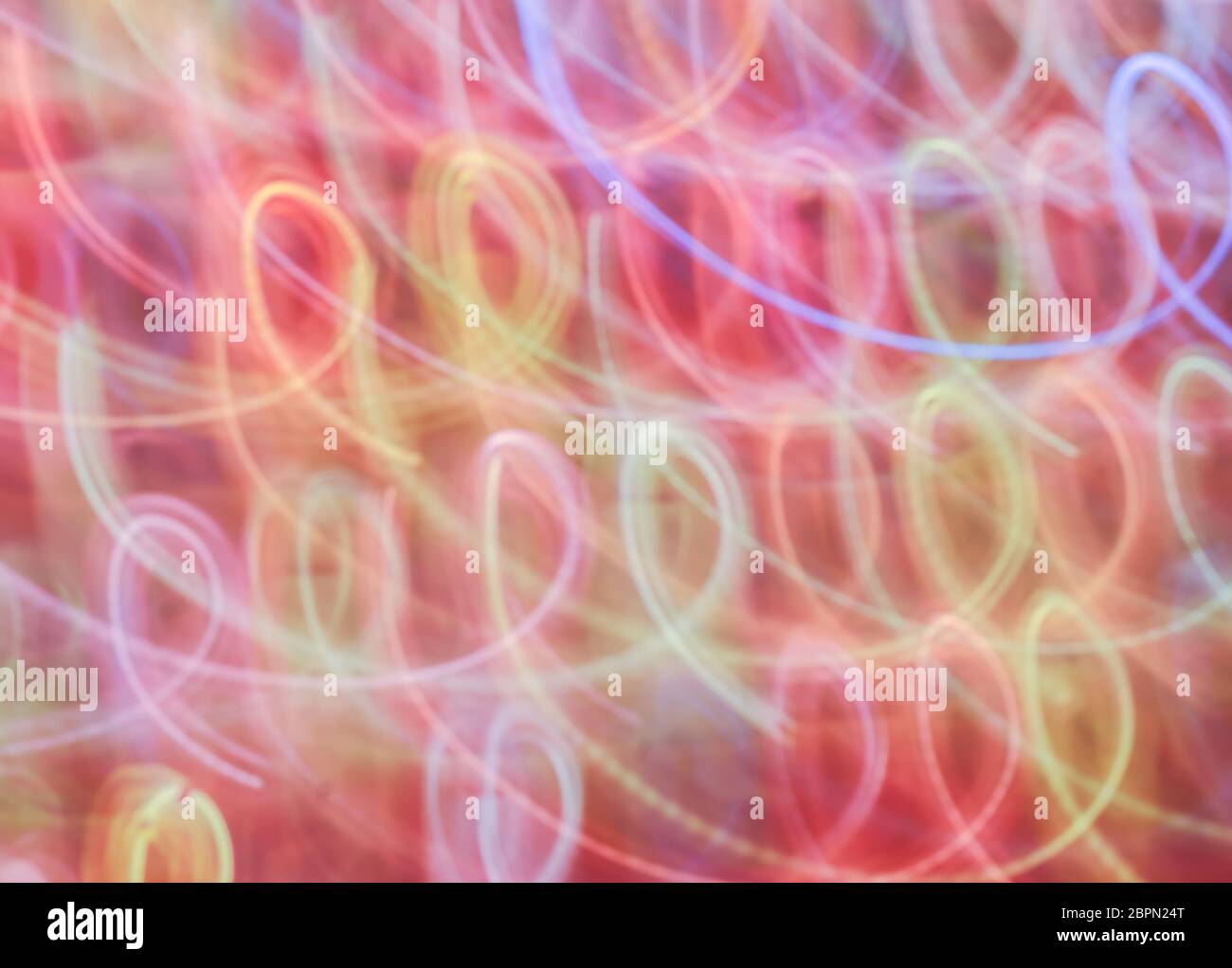 Abstract colorful background of neon lights on street with long ...