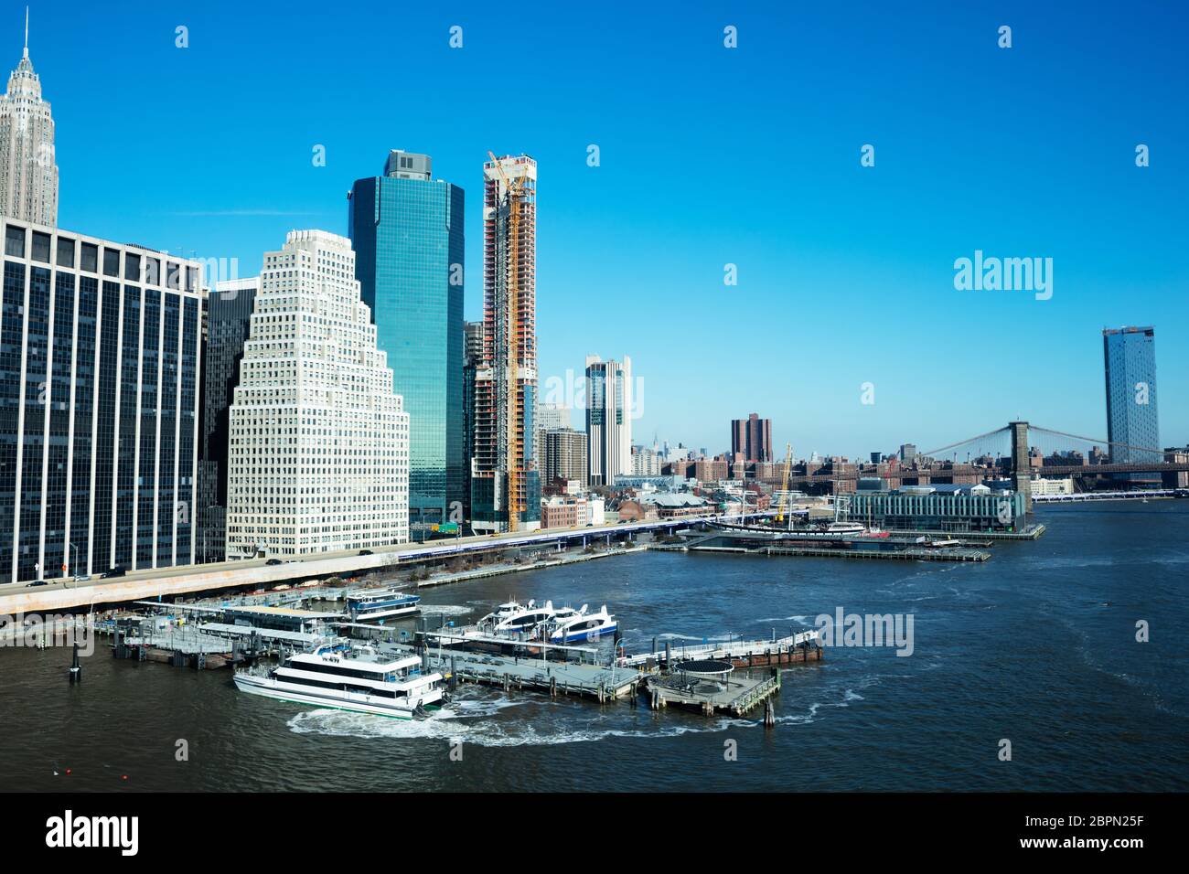 Manhattan Skyline With Yacht Boat On Harbor In New York Stock Photo - Alamy