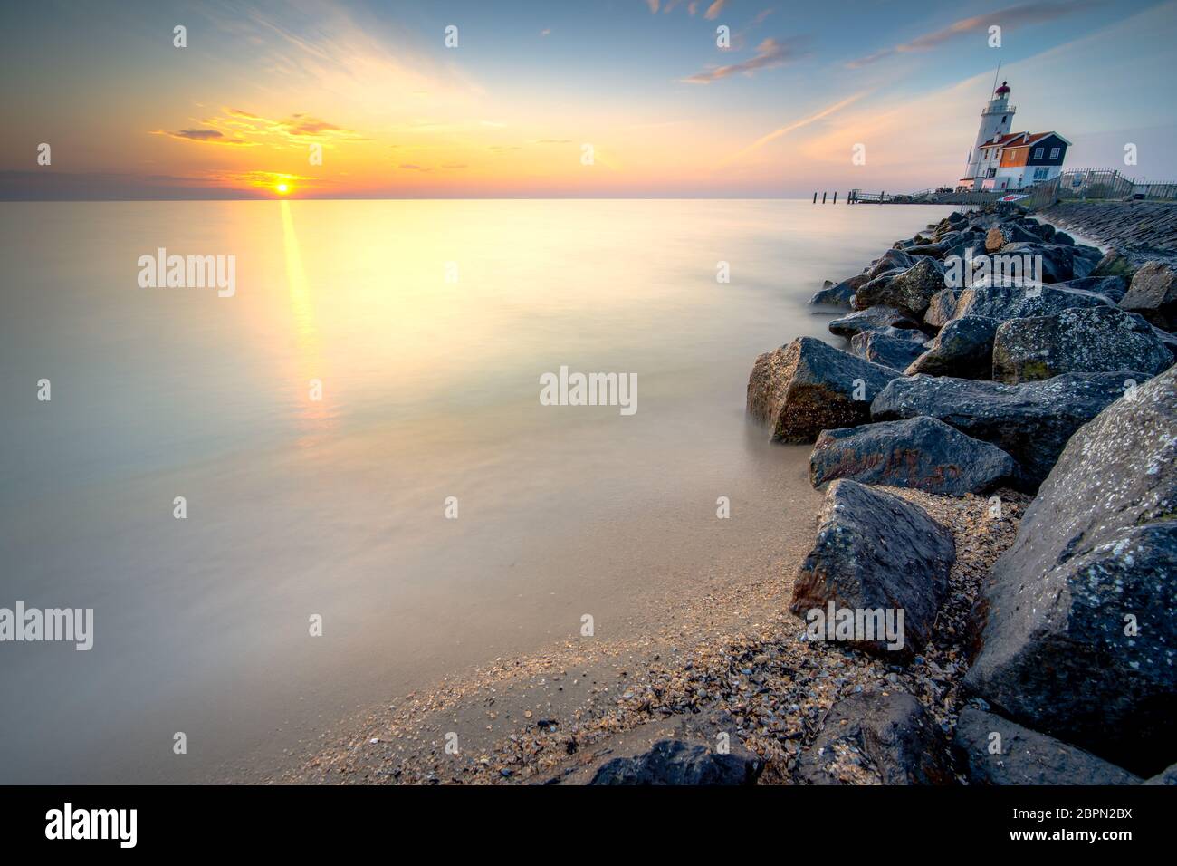 The Horse of Marken lighthouse (Het Paard van Marken) during sunrise ...