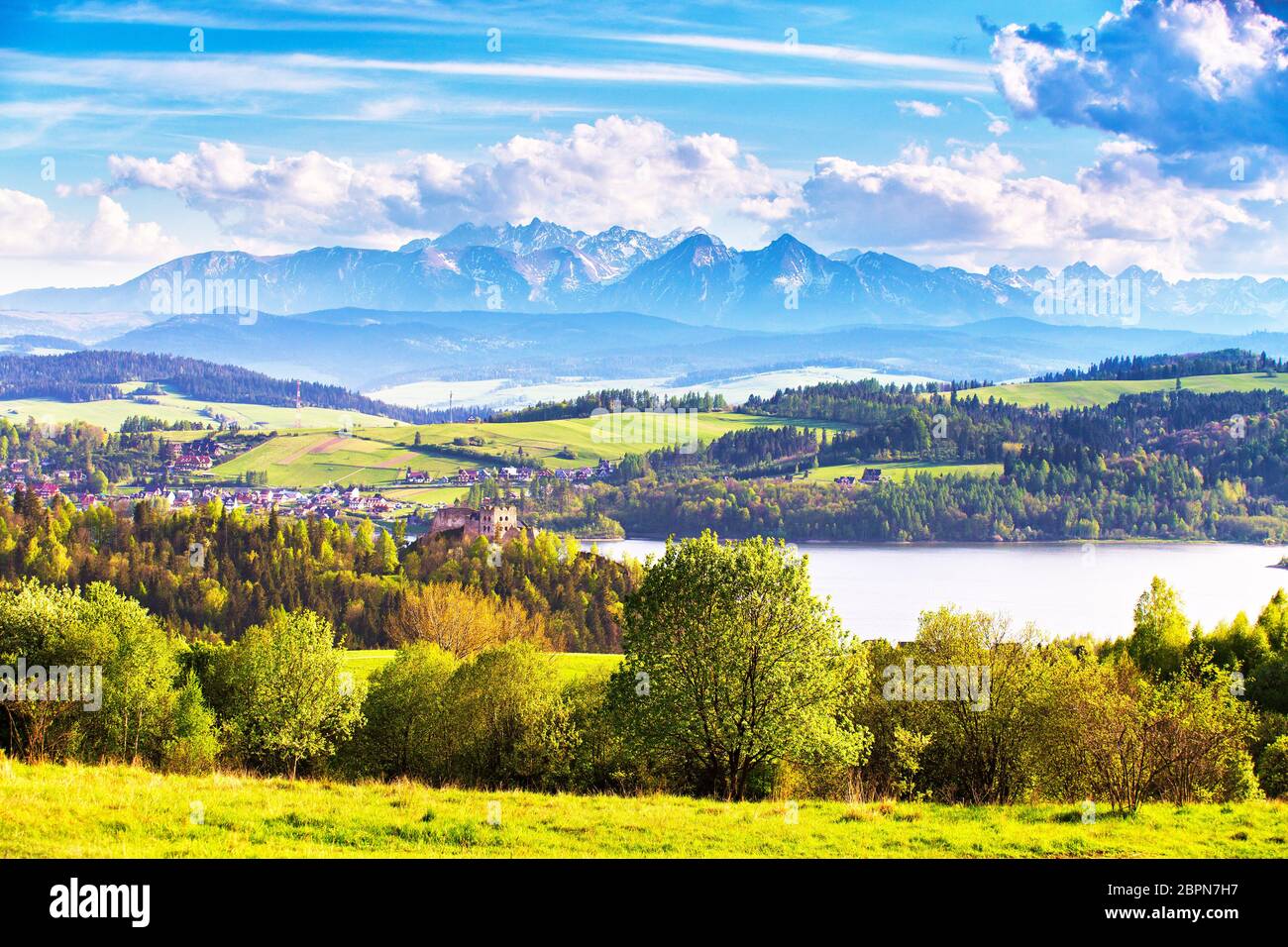 Green fields and meadows in Malopolska region, Poland. Czorsztyn castle ...
