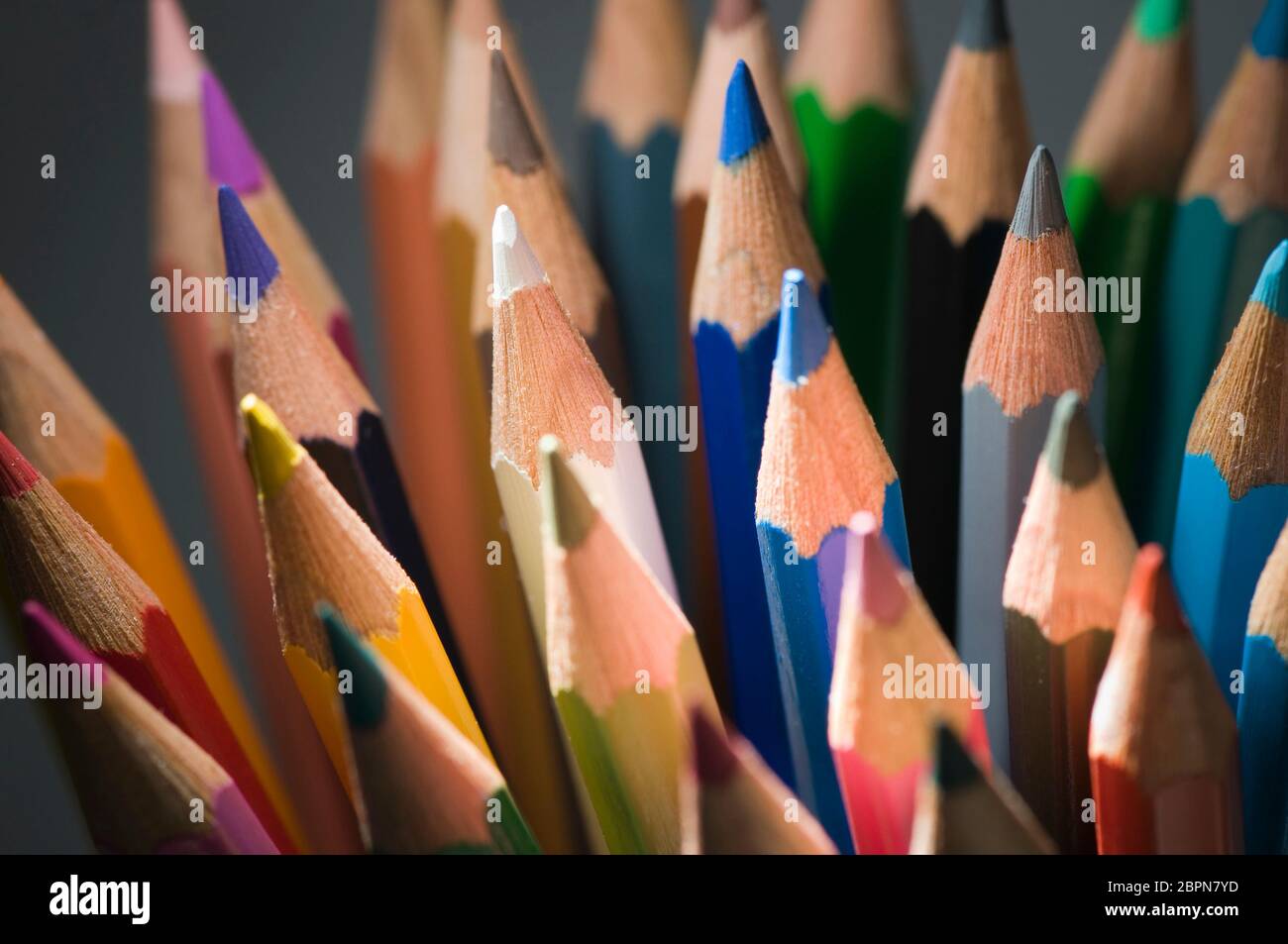 Close-up of vertical crayons in the hard sidelight Stock Photo - Alamy