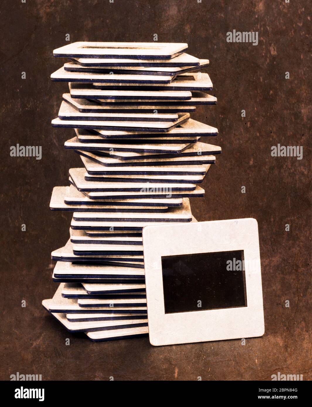 Retro blank slide photo framework against an old paper, grunge ...