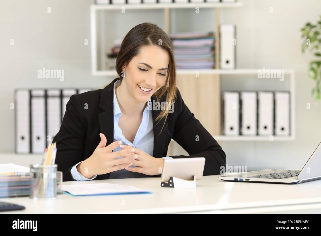 Videocall saleswoman hi-res stock photography and images - Alamy