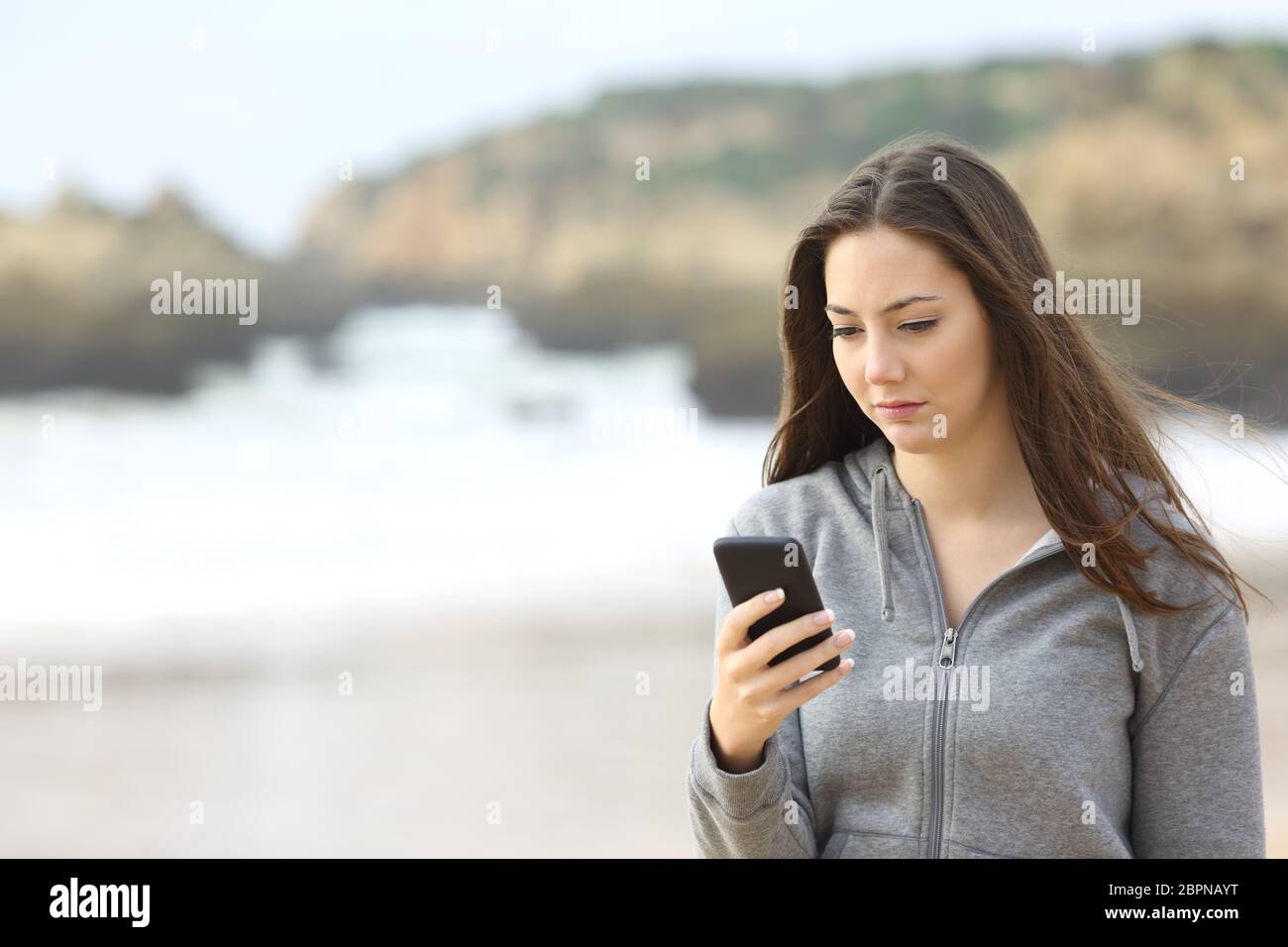 Teenager crying and smartphone hi-res stock photography and images - Alamy