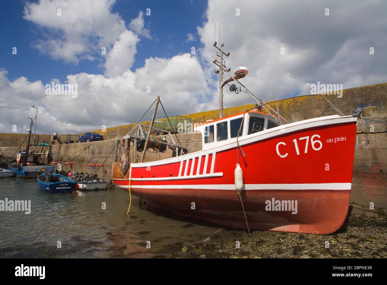 Red fishing boat, Helvick Head Pier, County Waterford, Ireland Stock ...