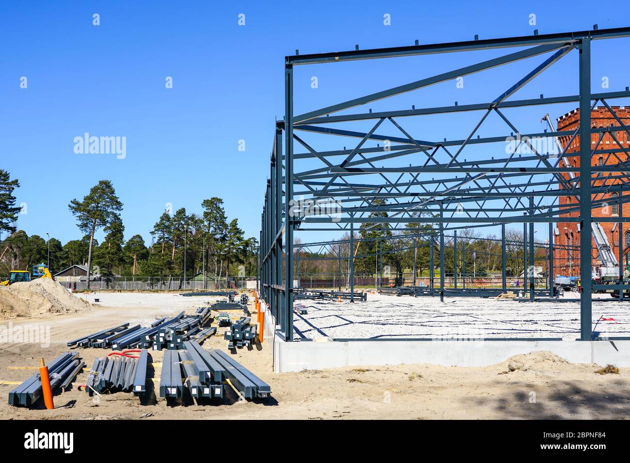 In the construction site new steel structure is under construction ...
