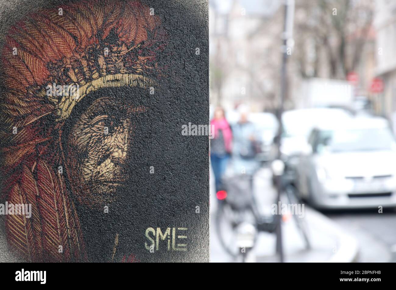 Graffiti street art portrait of a Native American Indian chief, in the ...