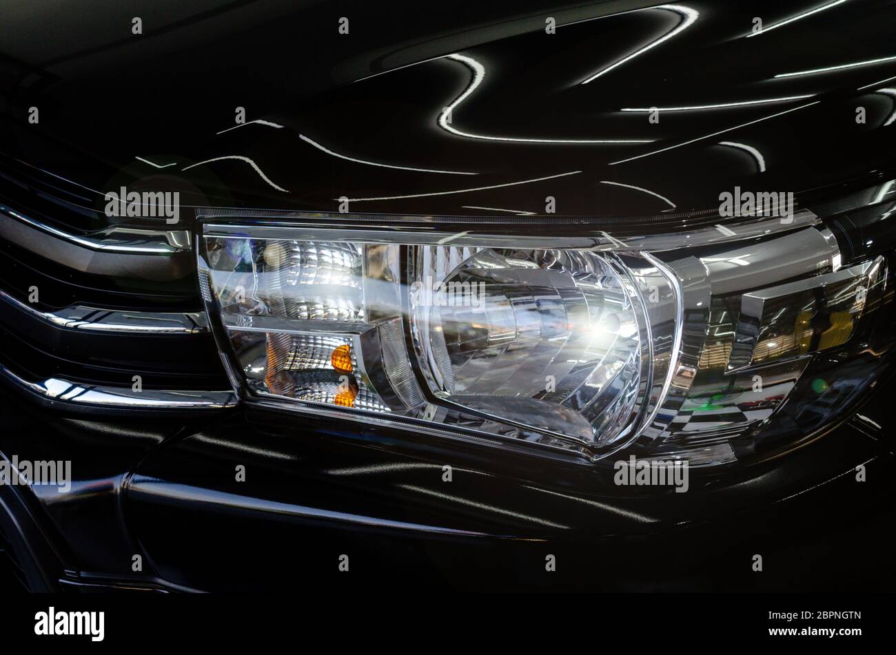 Modern luxury car headlight Stock Photo - Alamy