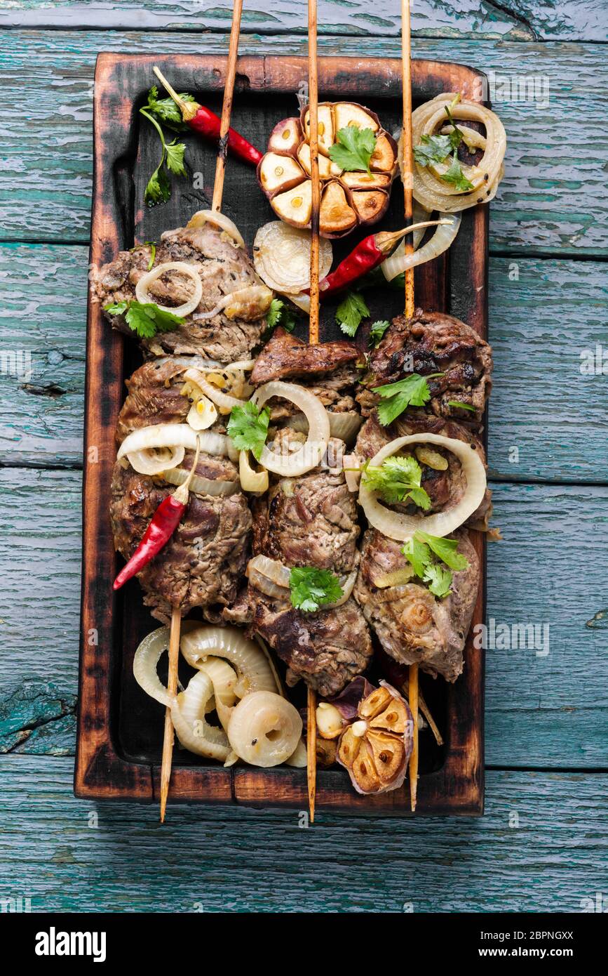 Grilled meat skewers, shish kebab.Dishes of oriental cuisine.Turkish ...