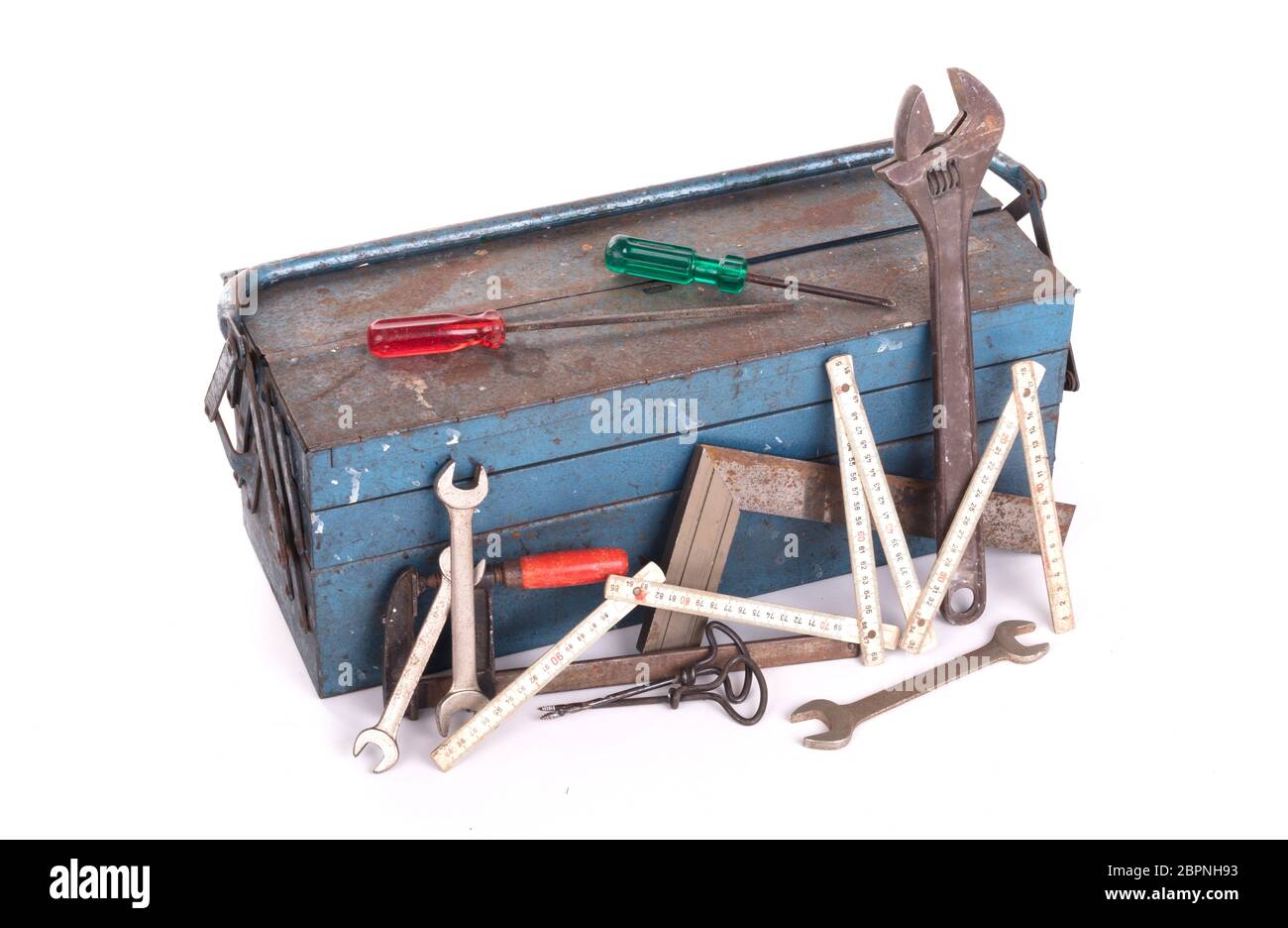 Old toolbox filled with vintage tools, isolated Stock Photo - Alamy