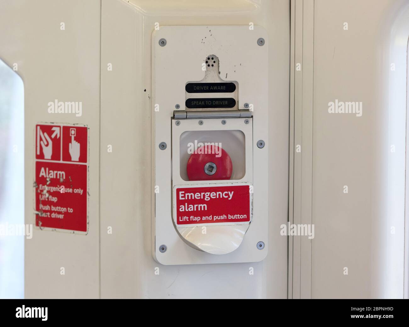 Emergency alarm button, London metro, push the button Stock Photo - Alamy