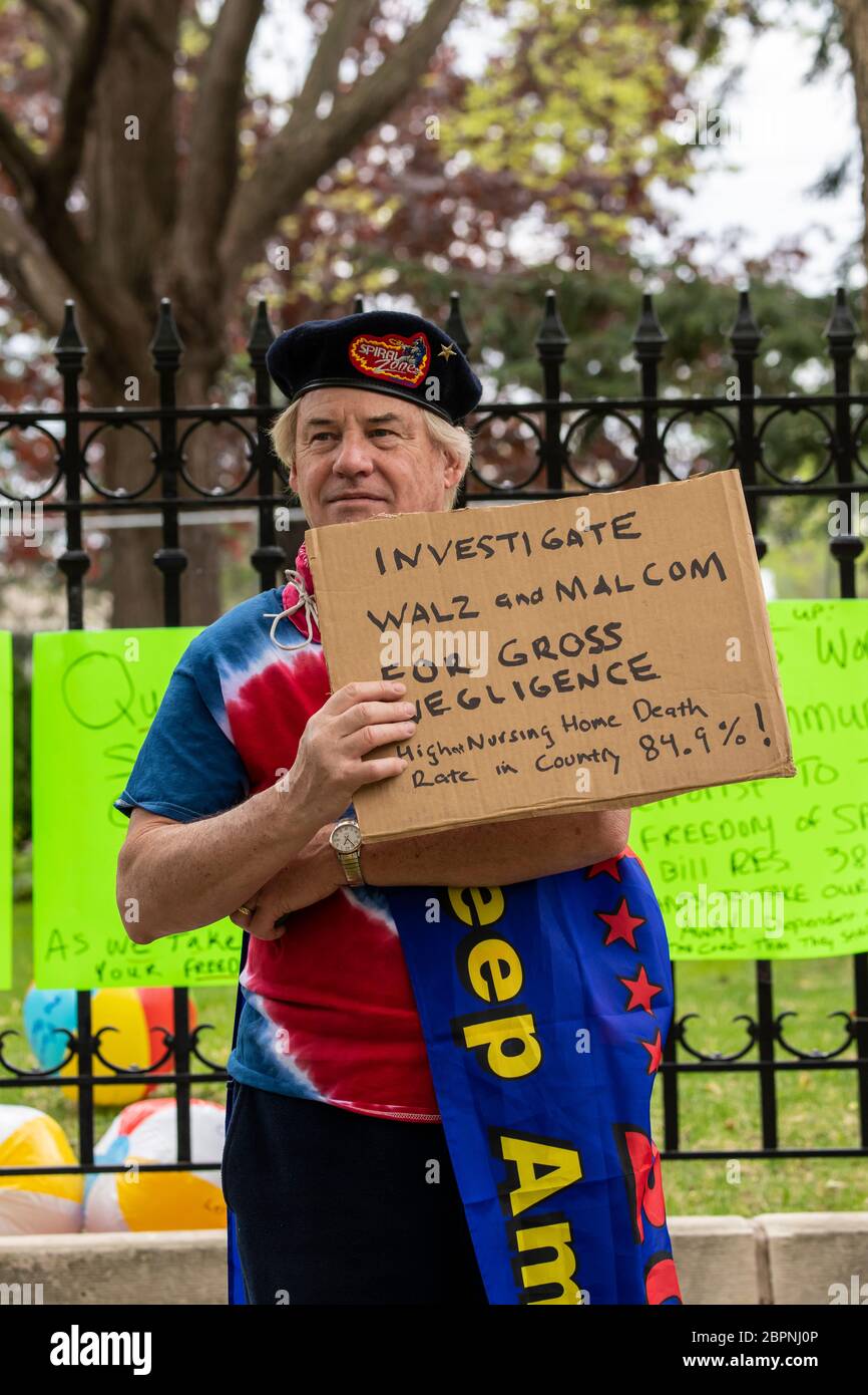 St. Paul, Minnesota. Protest at Governor Tim Walz's mansion to reopen ...