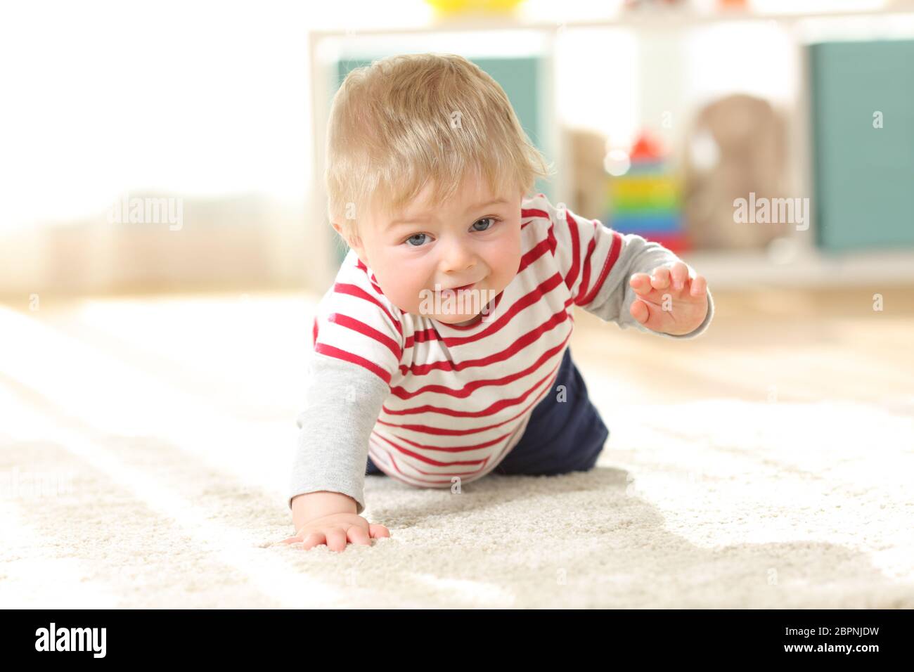 Baby crawling towards camera hi-res stock photography and images - Alamy