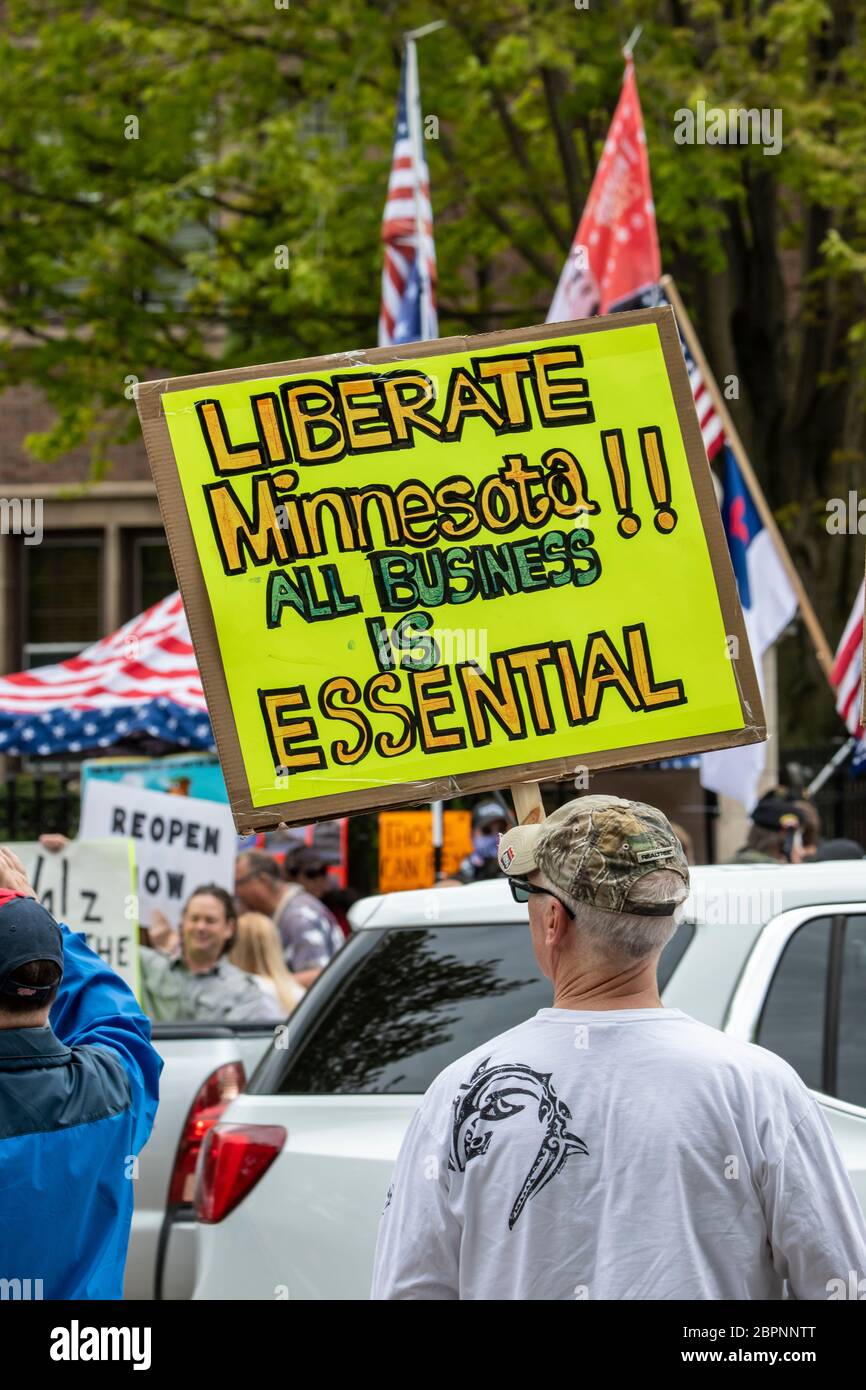 St. Paul, Minnesota. Protest at Governor Tim Walz's mansion to reopen ...