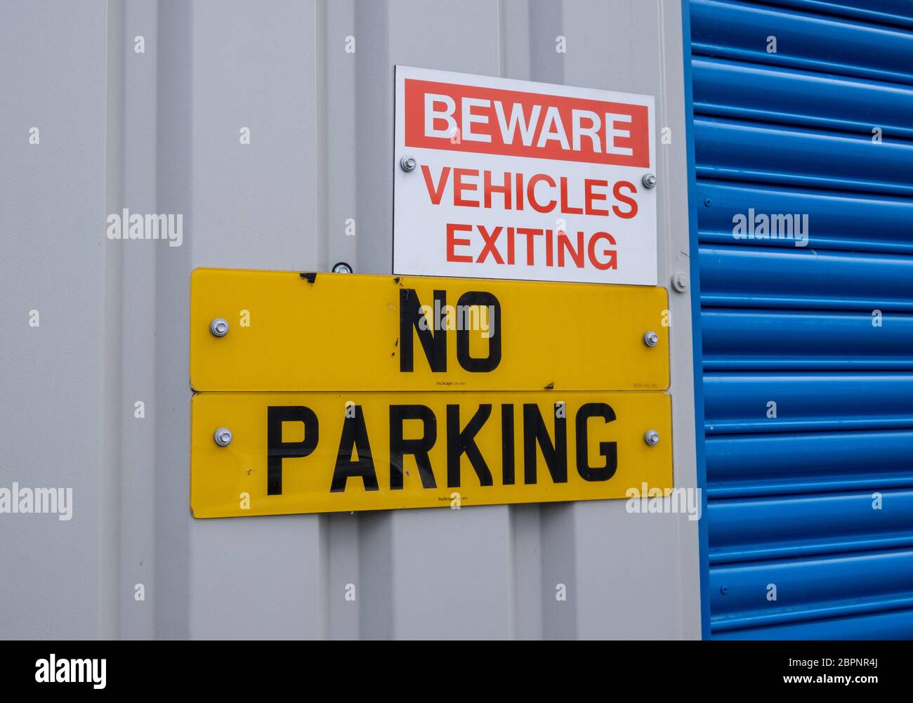 signs warning of vehicles exiting and no parking inBirkenhead Wirral ...