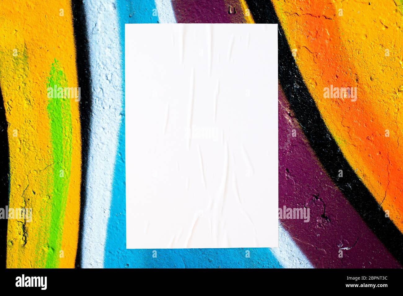Closeup of colorful messy painted urban wall texture with wrinkled ...