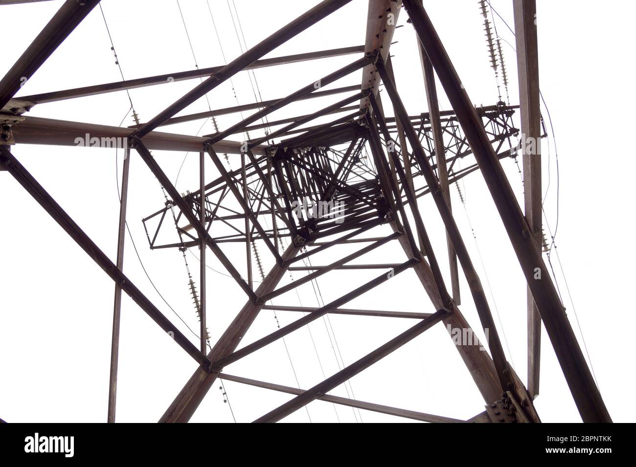 Old rusty mast of power lines on the city street Stock Photo - Alamy