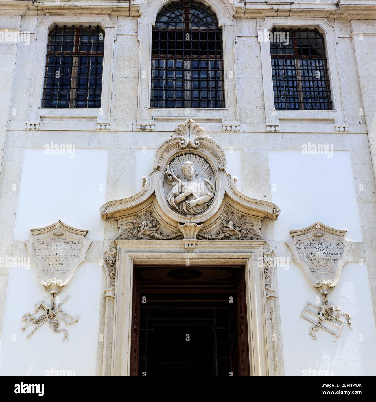 Medallion with the figure of St Joseph in high relief, flanked by two ...