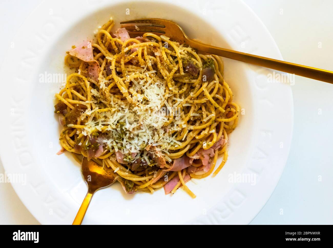Spaghetti with cooked ham and tomatoes Stock Photo - Alamy