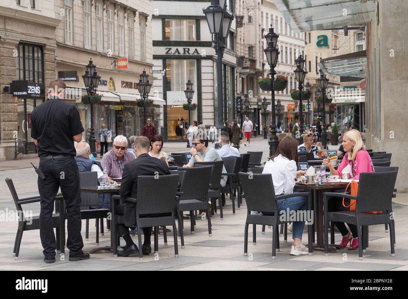 Budapest, Hungary. 19th May, 2020. People are seen at an outdoor ...