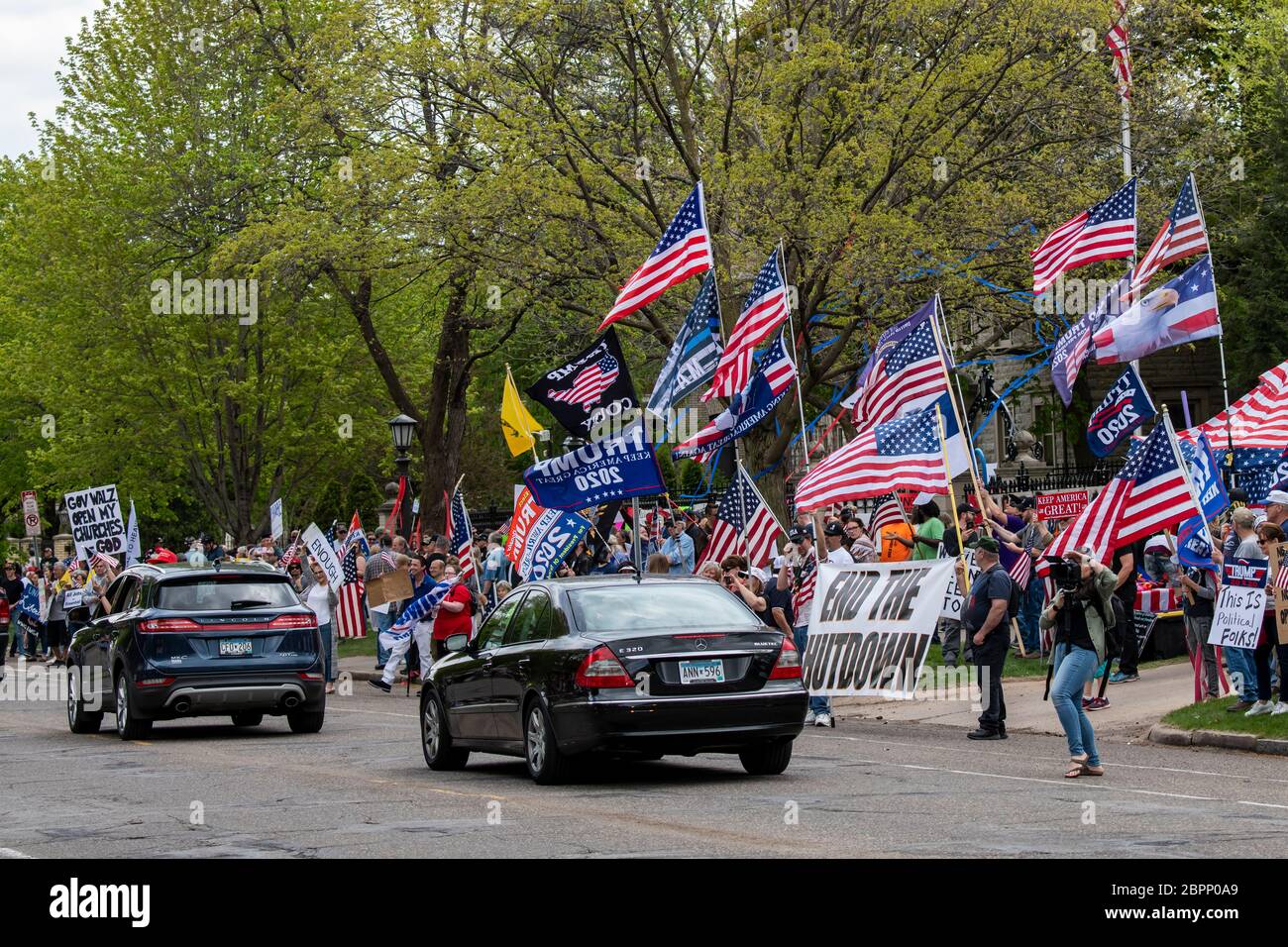 St. Paul, Minnesota. Protest at Governor Tim Walz's mansion to reopen ...