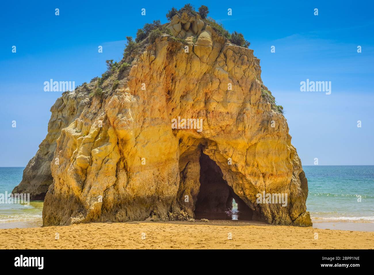 Big rock the ocean on beach, Praia da Rocha, Rock Beach, Portugal Stock ...