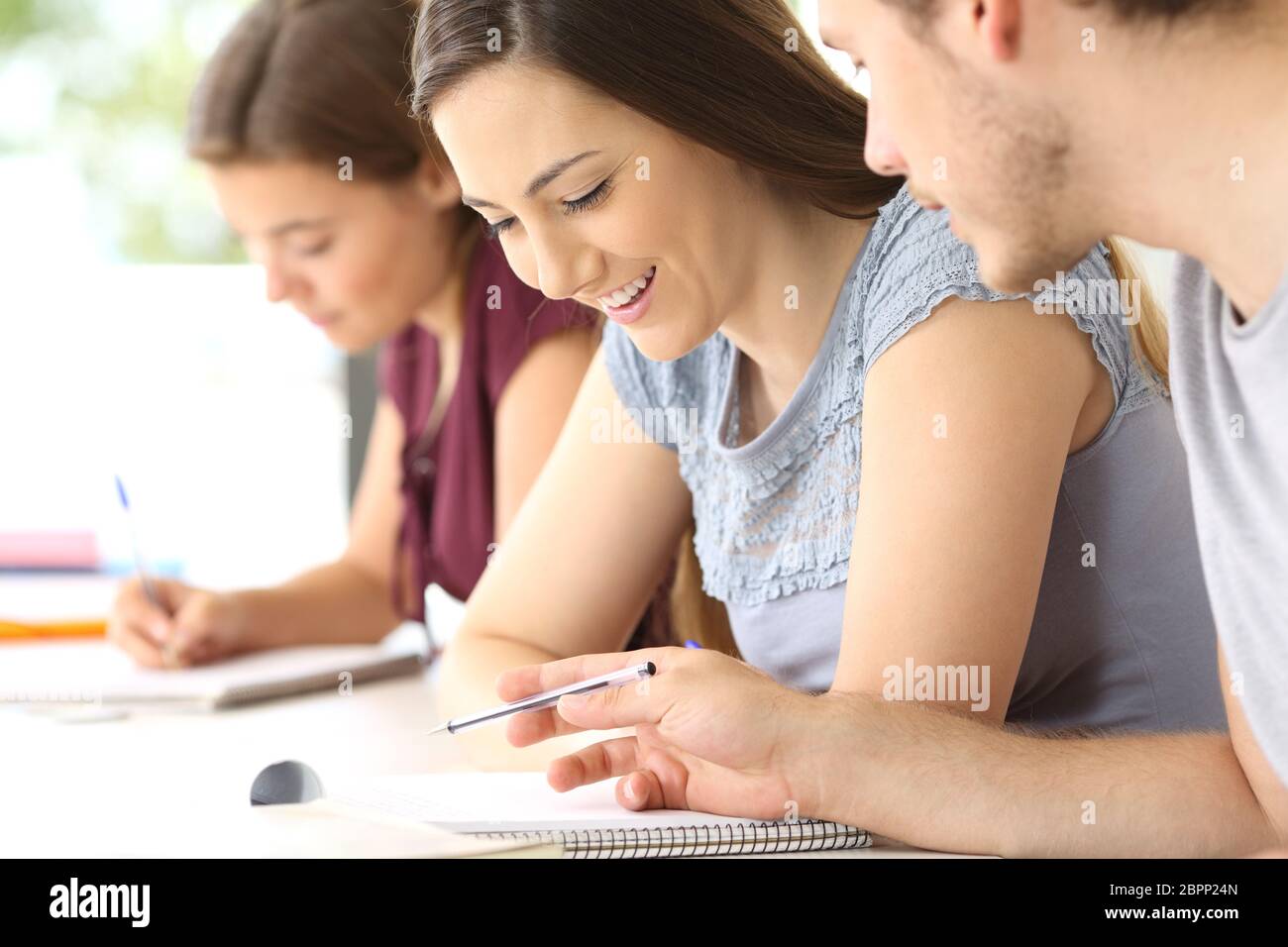 Group teens work together classroom hi-res stock photography and images ...