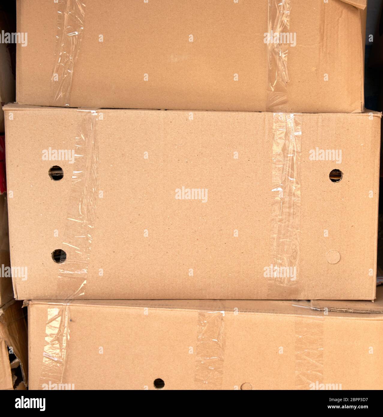 stack of brown cardboard boxes, full frame Stock Photo - Alamy