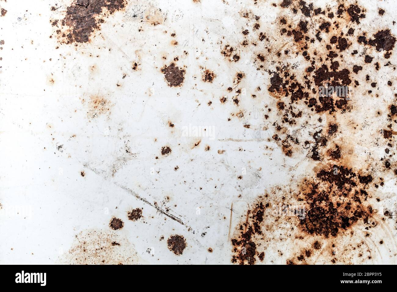 Bright rust stains texture paint showing through to rust underneath ...