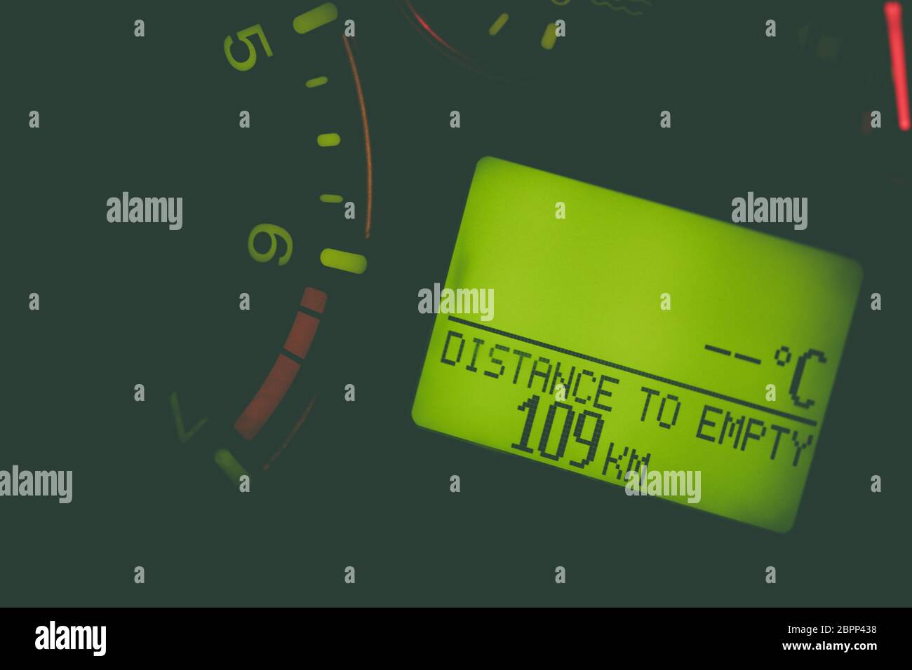 Electronic display of a car showing the distance to empty Stock Photo ...