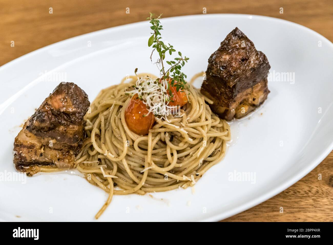 Spaghetti pasta with Pork Belly Thai southern style Stock Photo - Alamy