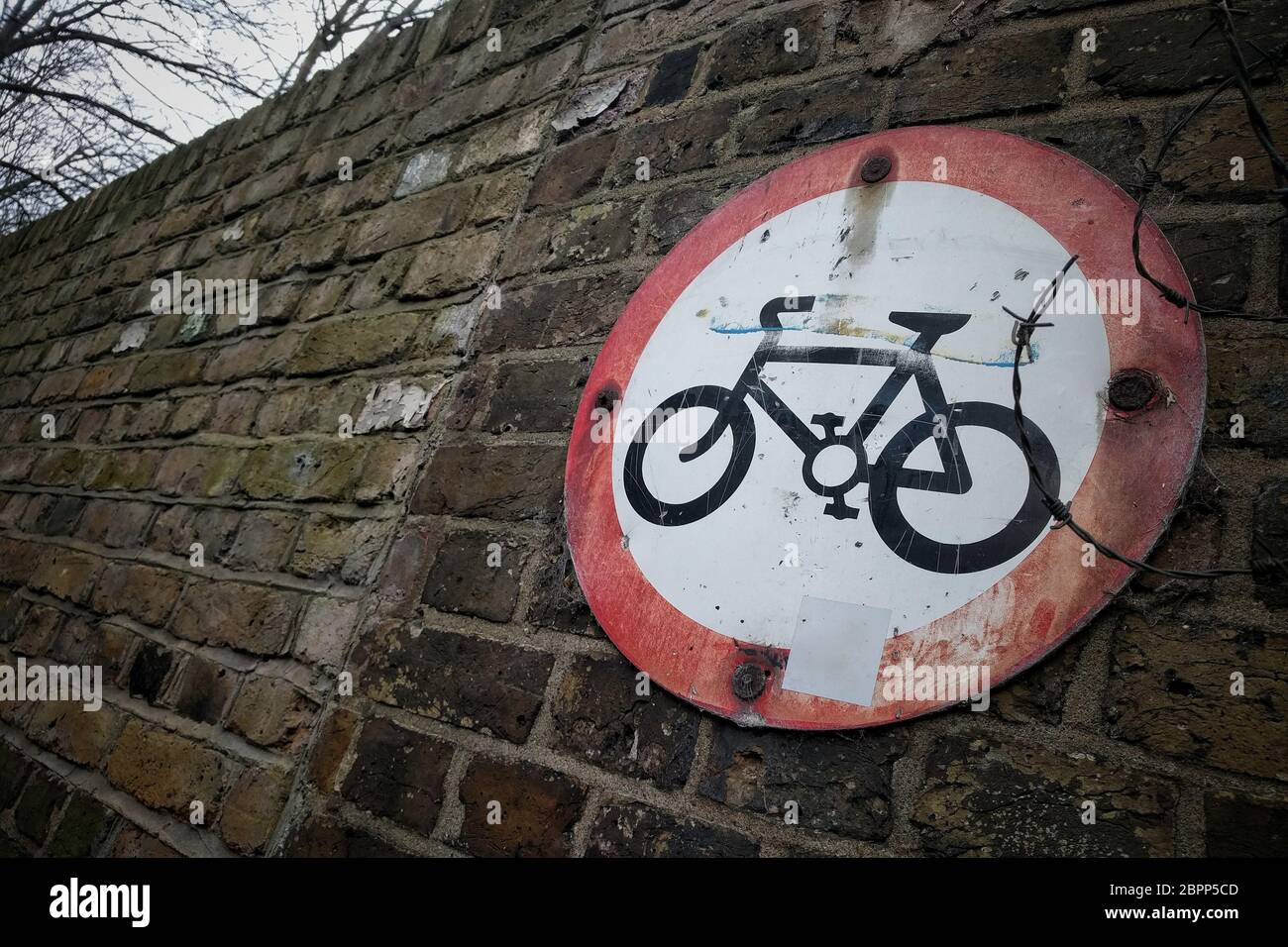Image of a forbidden access sign for bicycles, on a wall Stock Photo ...