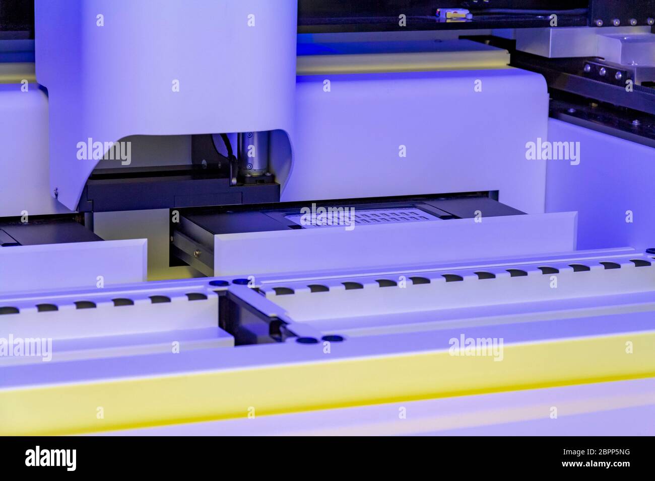colorful illuminated detail of a medical apparatus in a laboratory ...