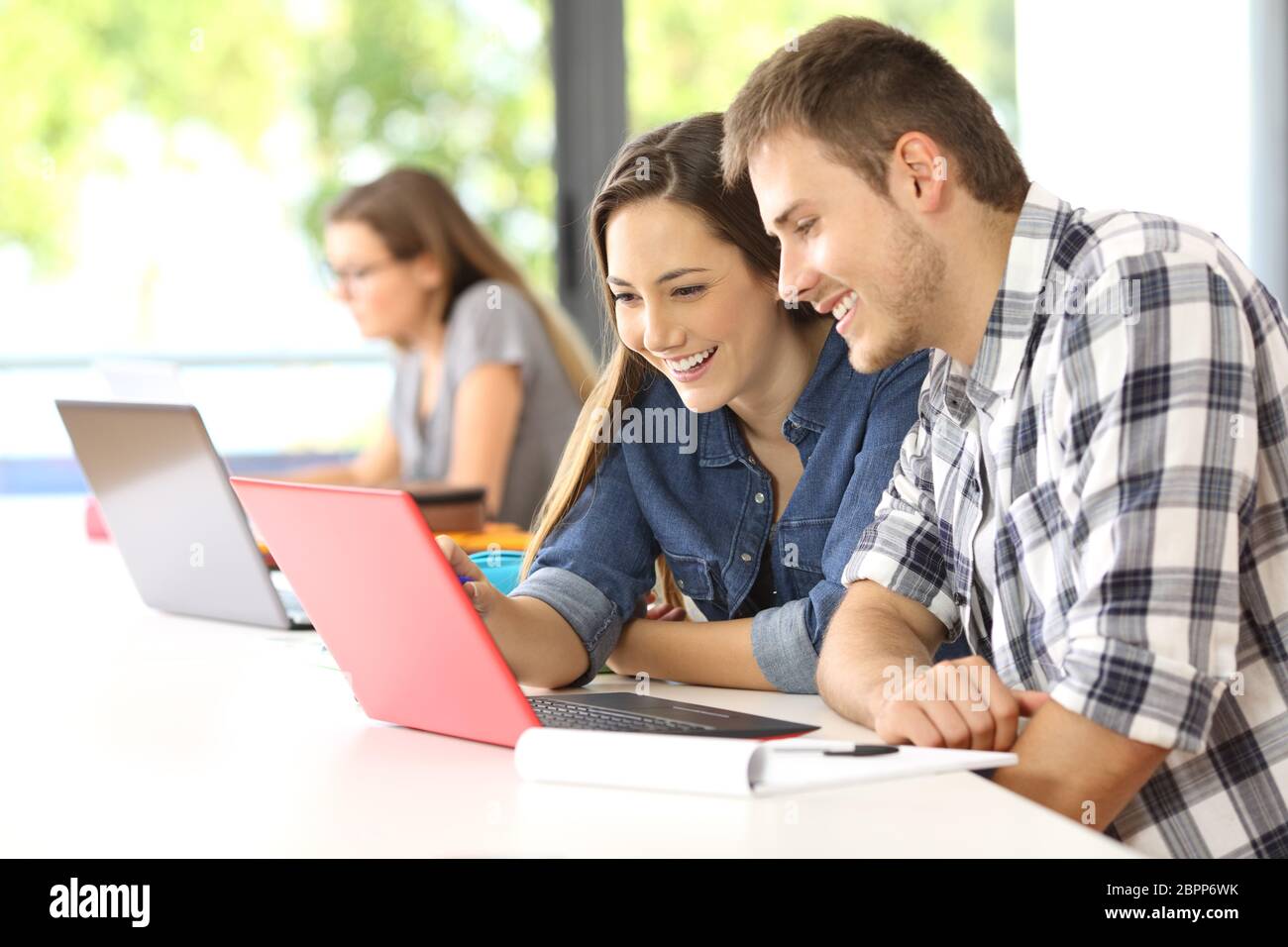 Schoolwork help in class hi-res stock photography and images - Alamy