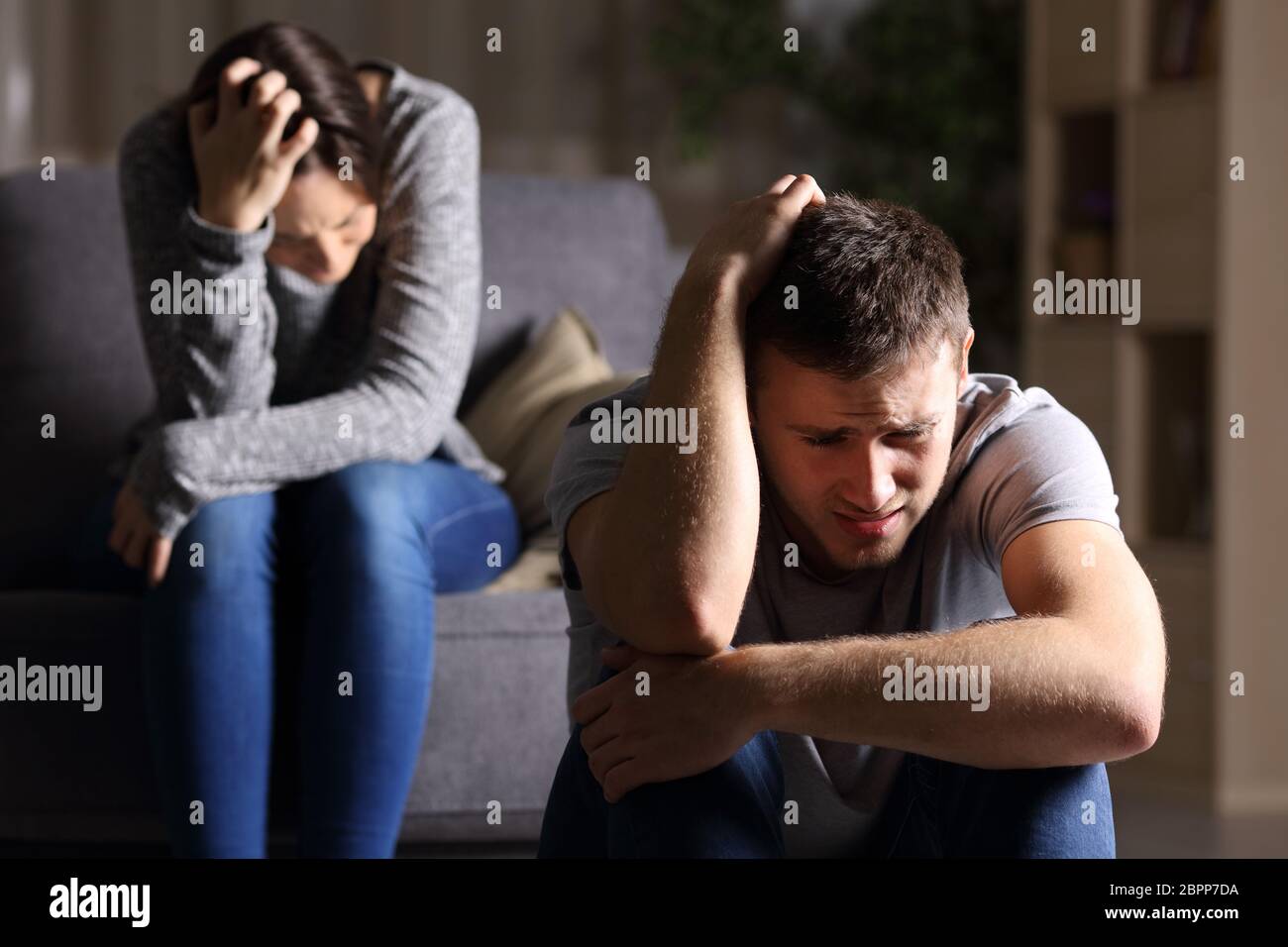 Couple woman crying on couch hi-res stock photography and images - Alamy