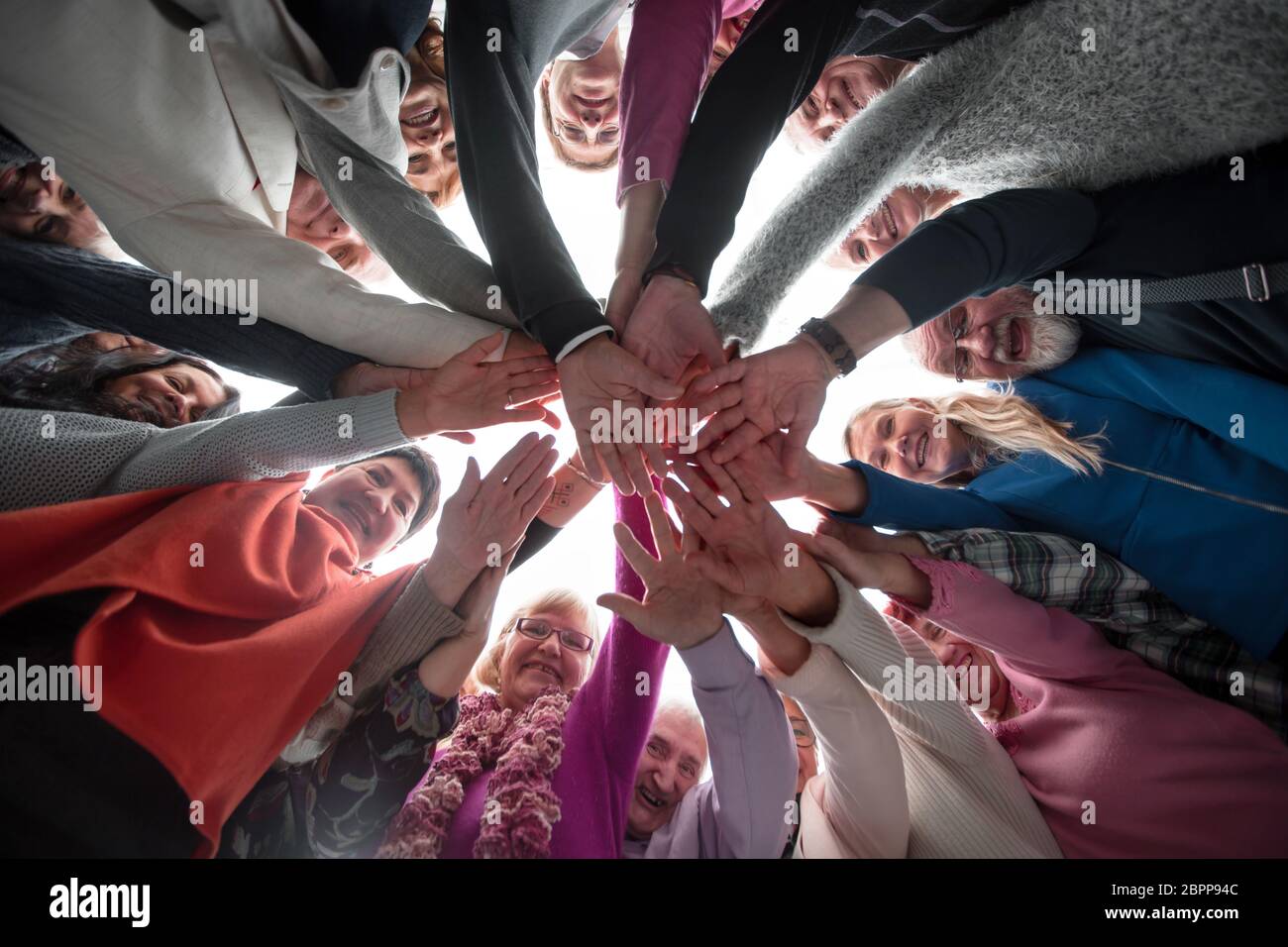 Stacked palms hi-res stock photography and images - Alamy